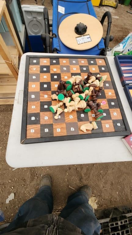 Chess board, backgammon set, monopoly token