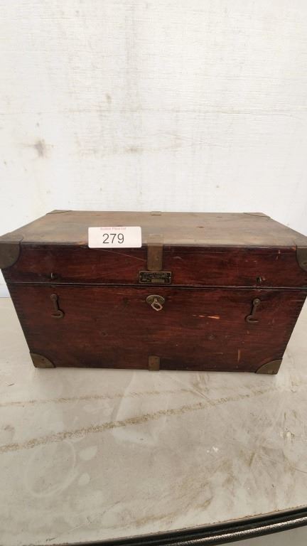 Wood storage chest with key