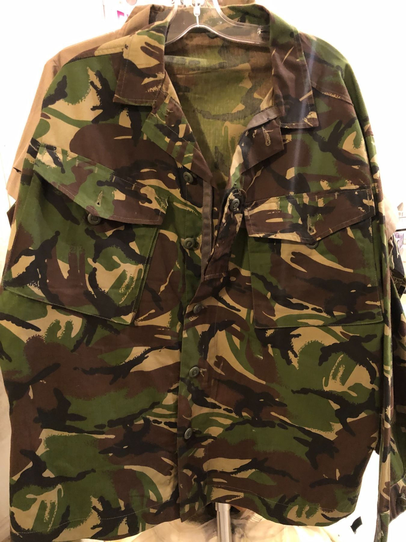 Large Group of Screen Worn Military Uniforms (Contents of 2 Racks)