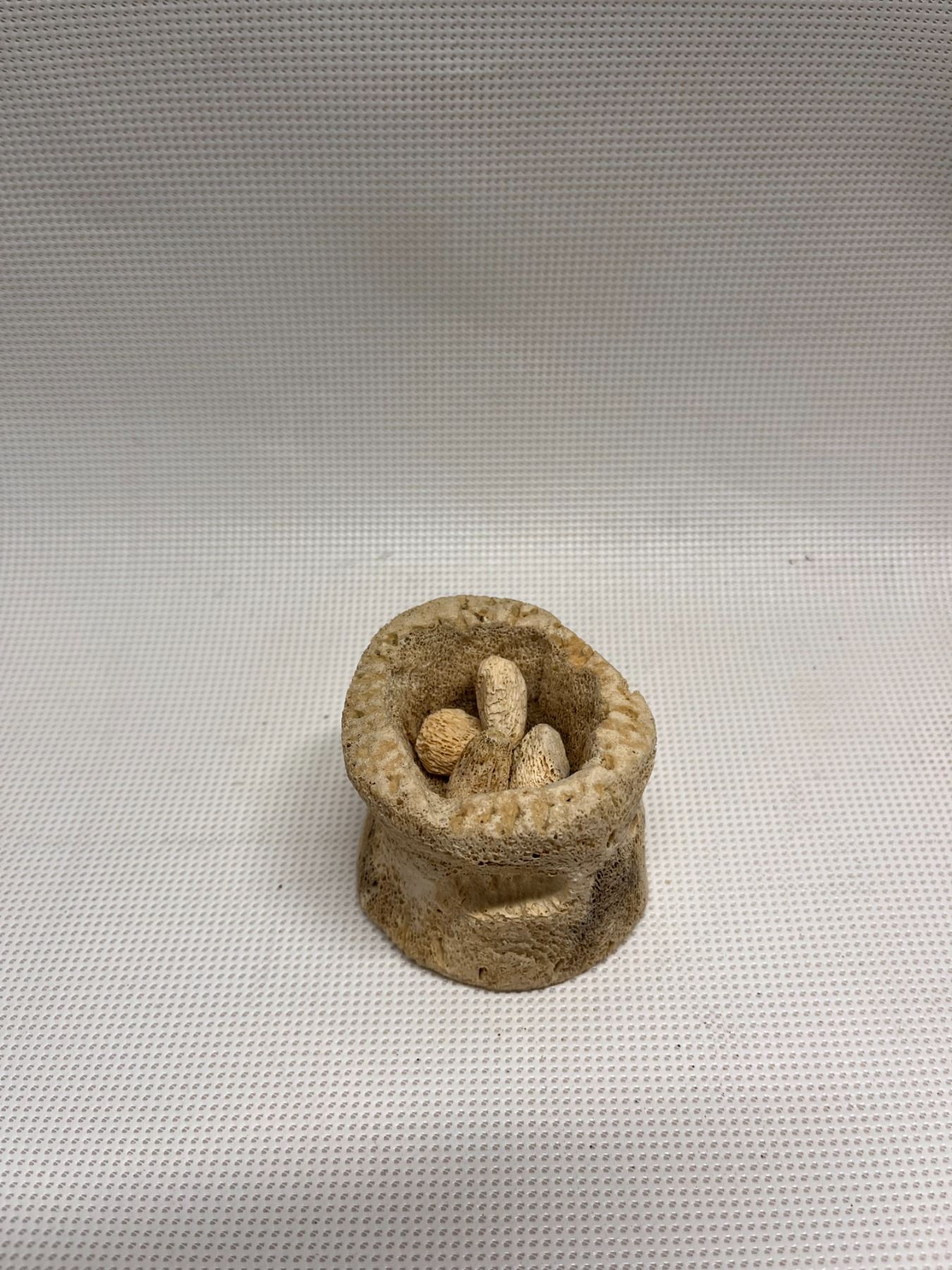 Inuit carved bone nest with tiny eggs. See photos for details