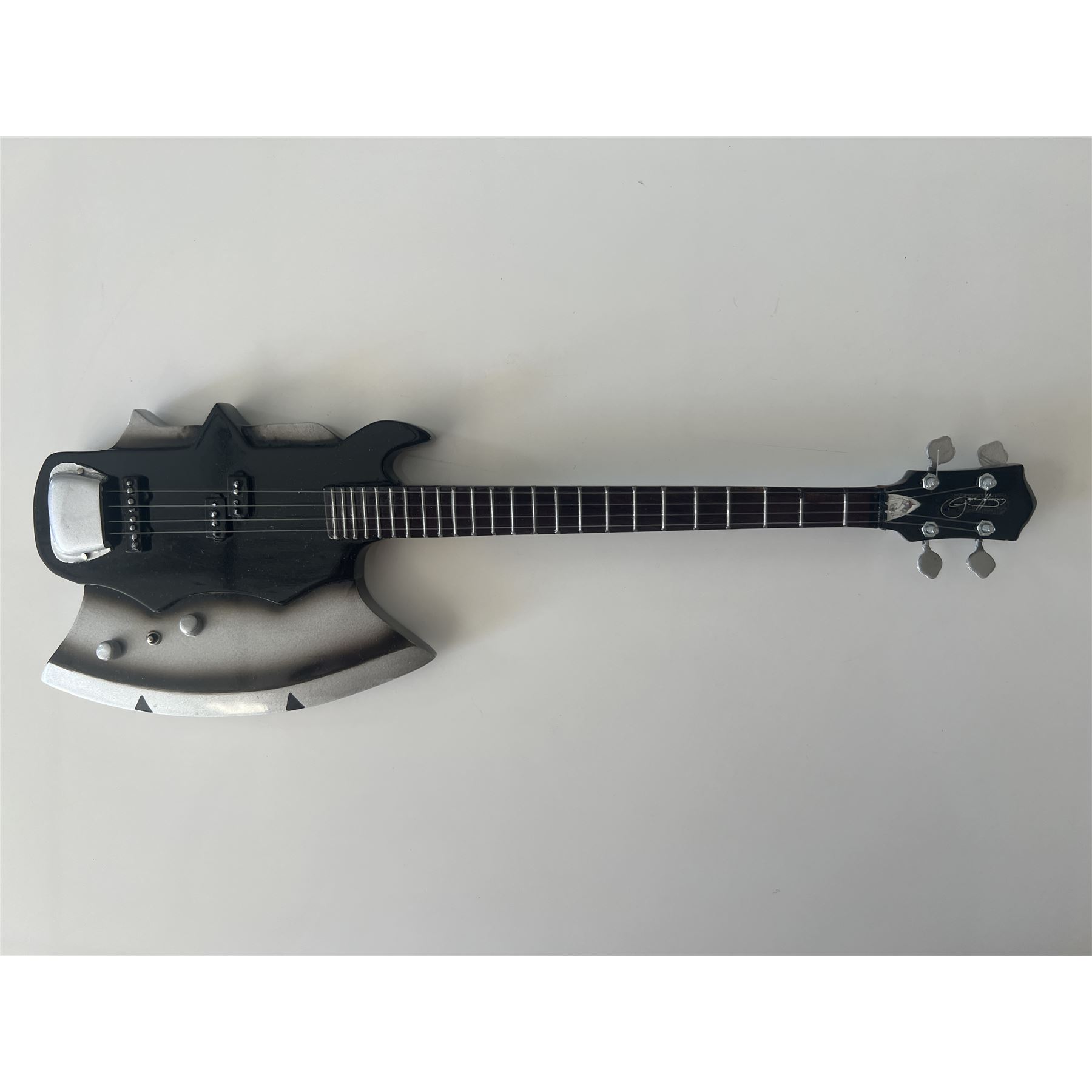 Axe Heaven unsigned mini Gene Simmons Axe guitar