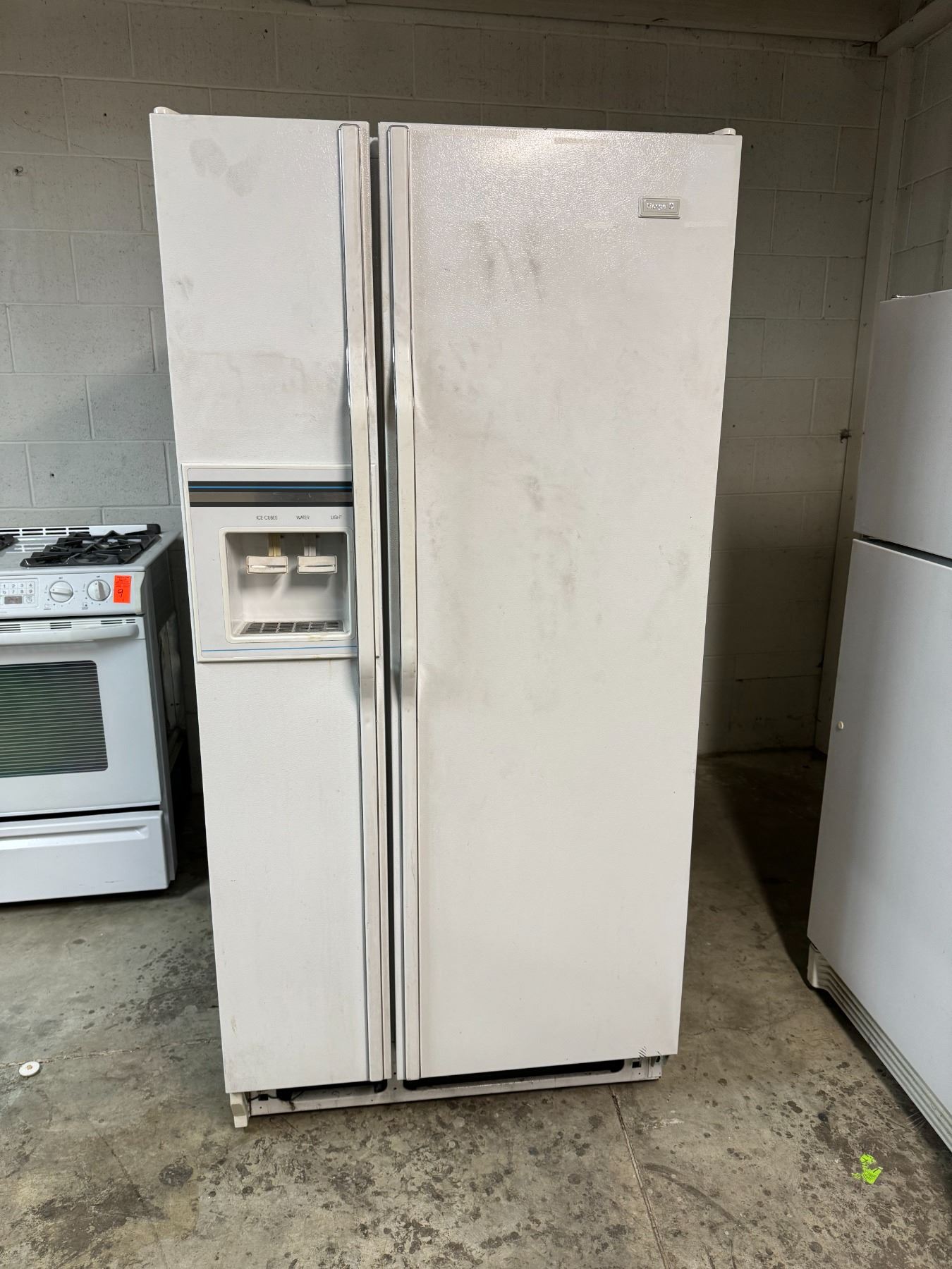 Side by side fridge/freezer from estate