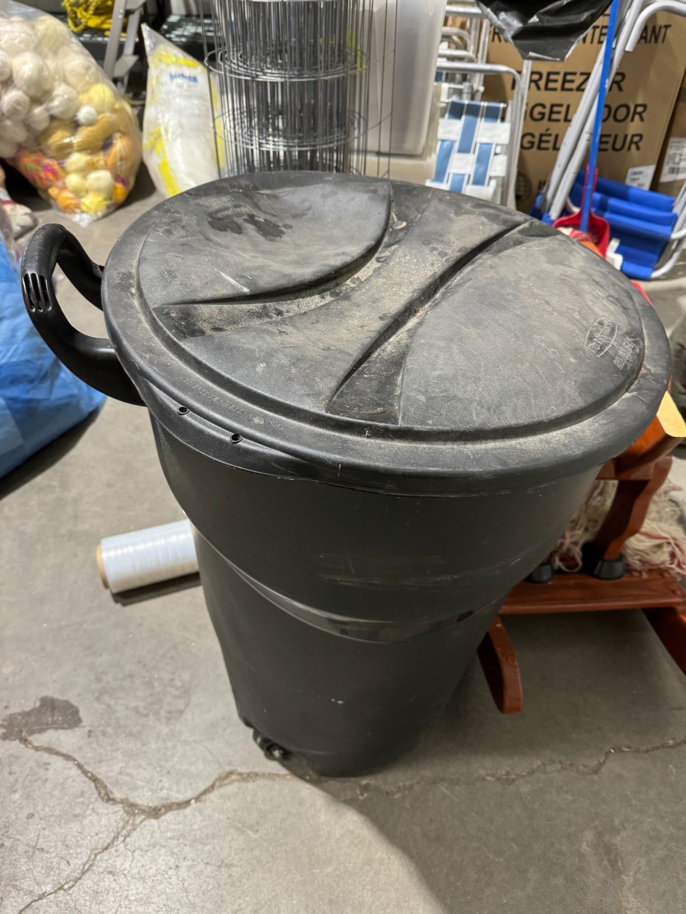 Garbage can with bird feed