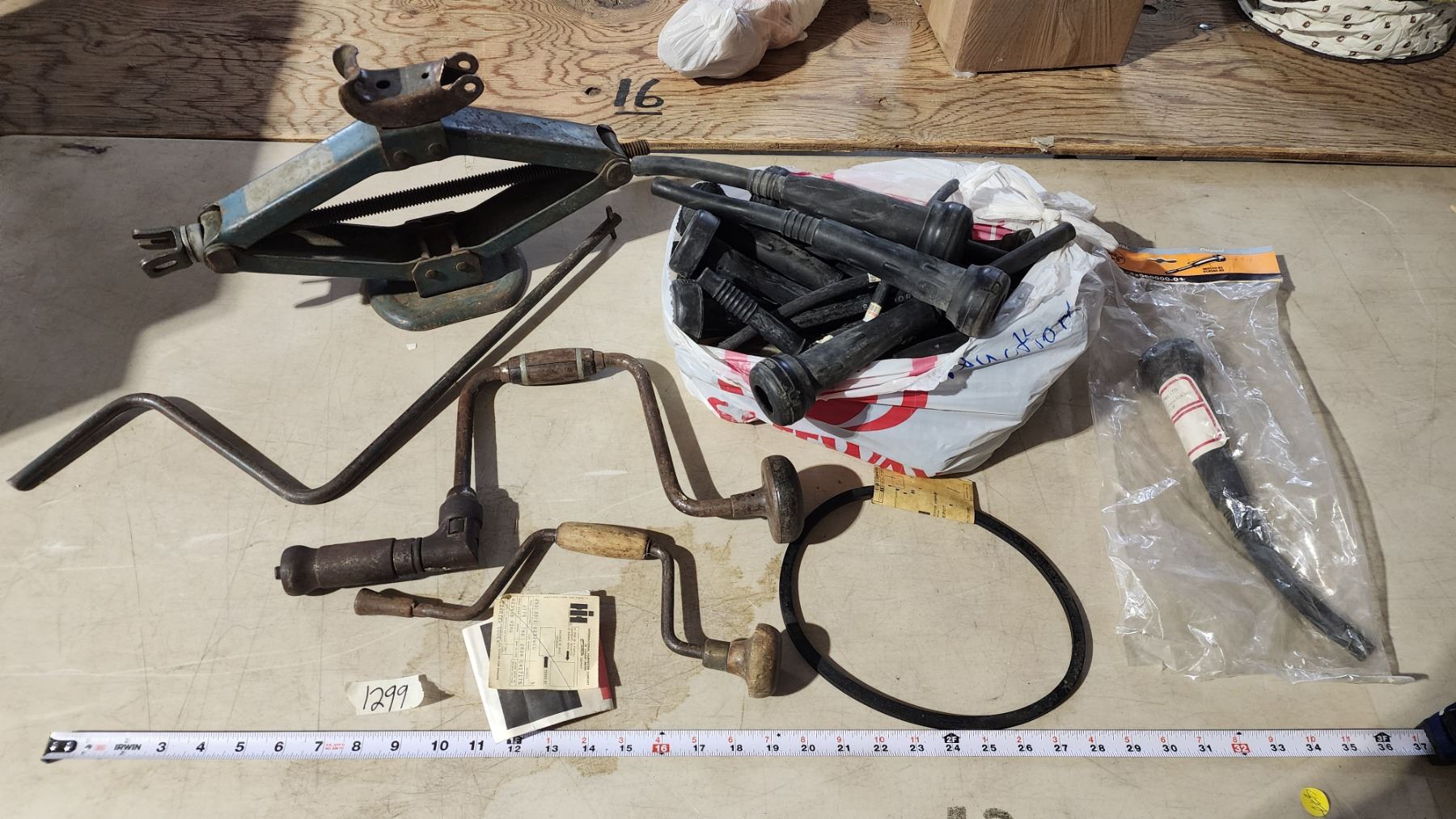 Assorted hardwares - Bundle of rubber cow milking tubes, car jack ...