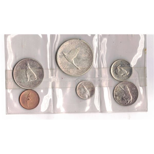 1967 Silver Dollar, 50 cents, quarter, dime , nickel and penny