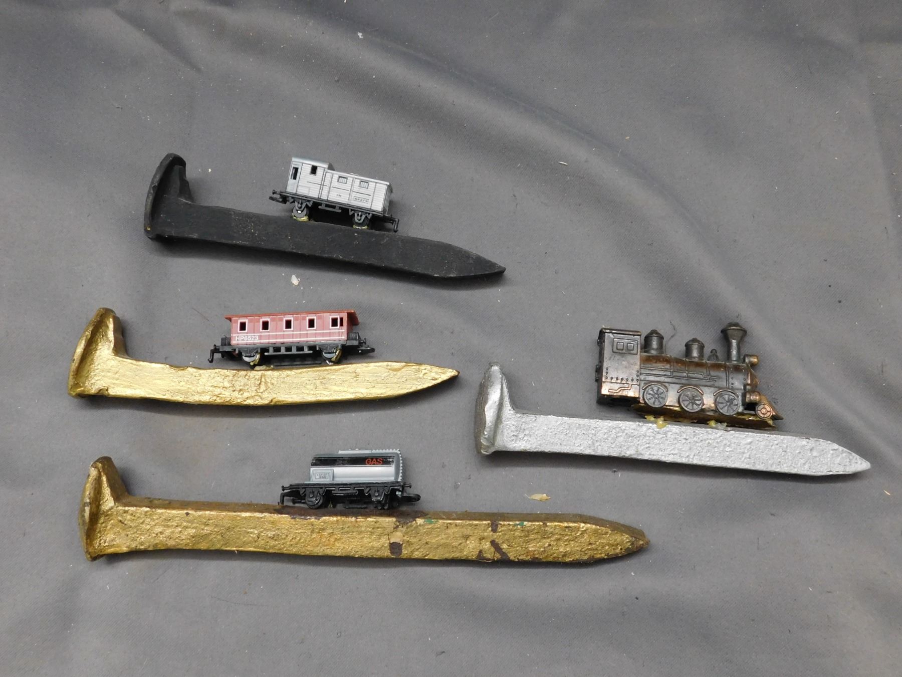 Lot of Railway Spikes and Small Train Carts
