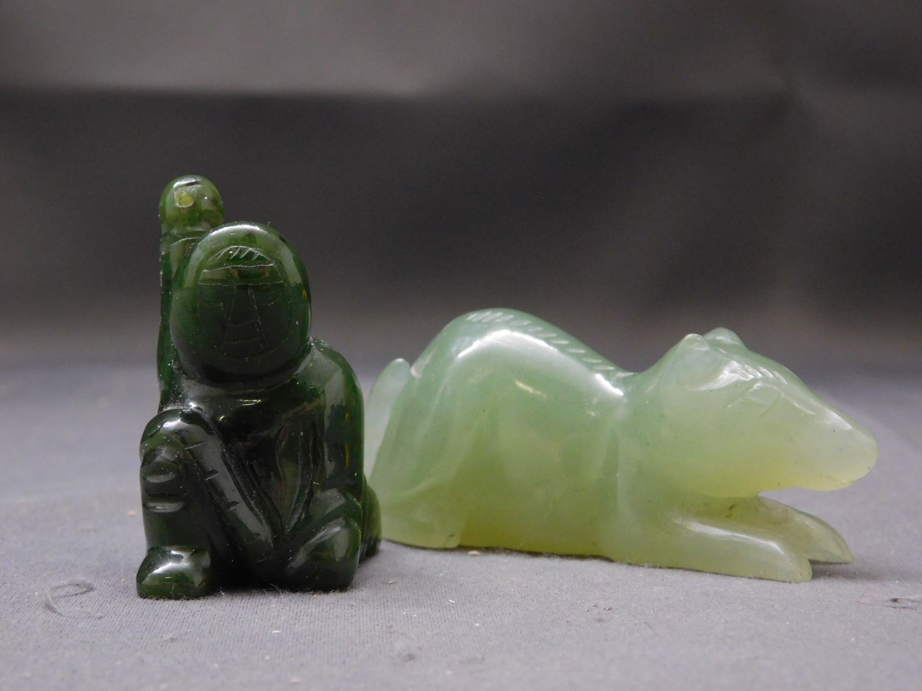Lot of 2 Jade Carvings Inuit Man and Small Animal