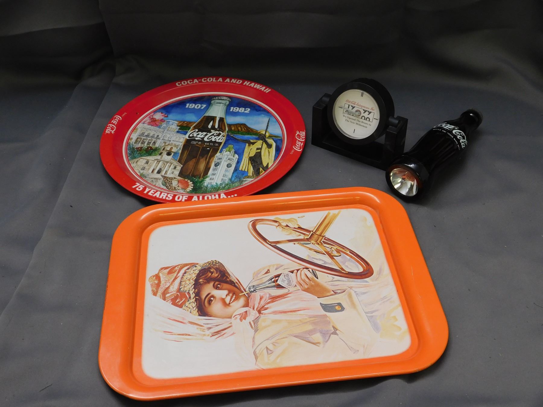 Lot of 4 Coca Cola Trays, Coke Bottle Flashlight, and Desk Clock