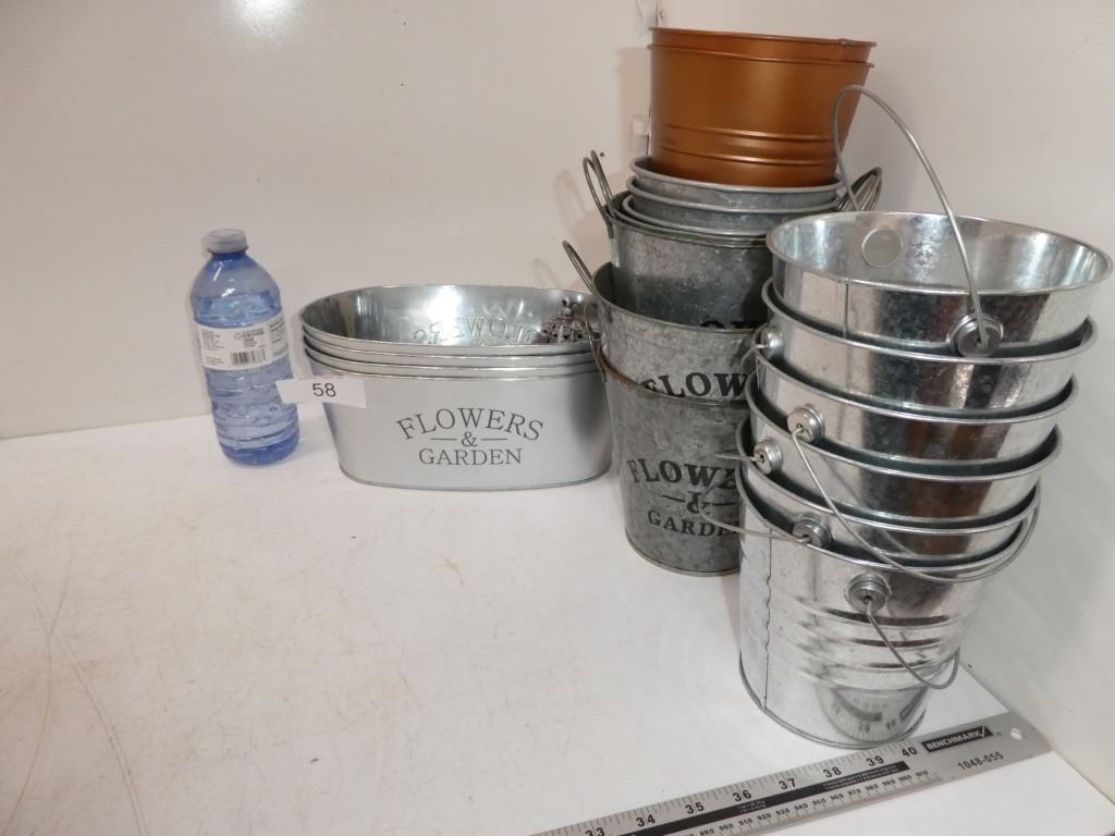 Collection of metal buckets, lanterns