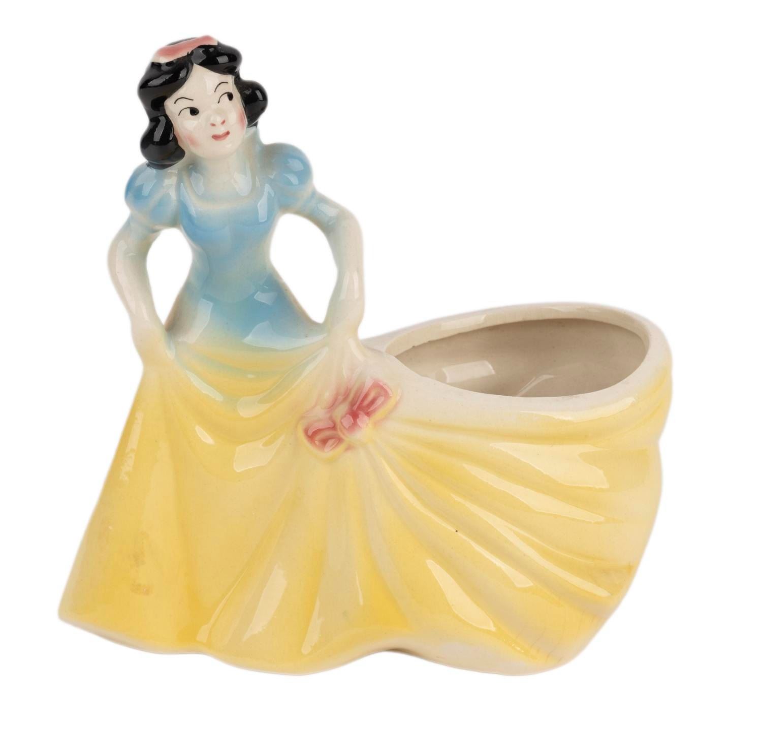 A 1940s Snow White Ceramic Planter.