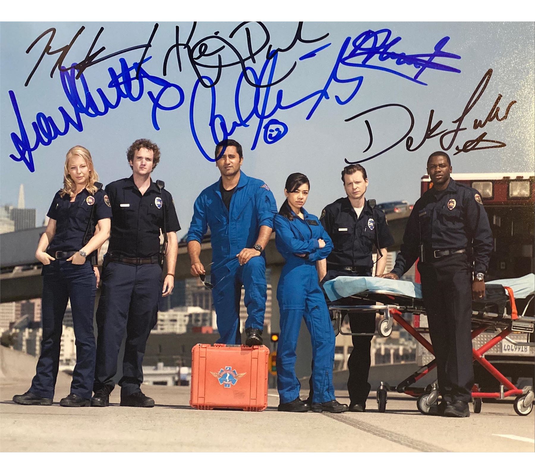 Trauma cast signed photo
