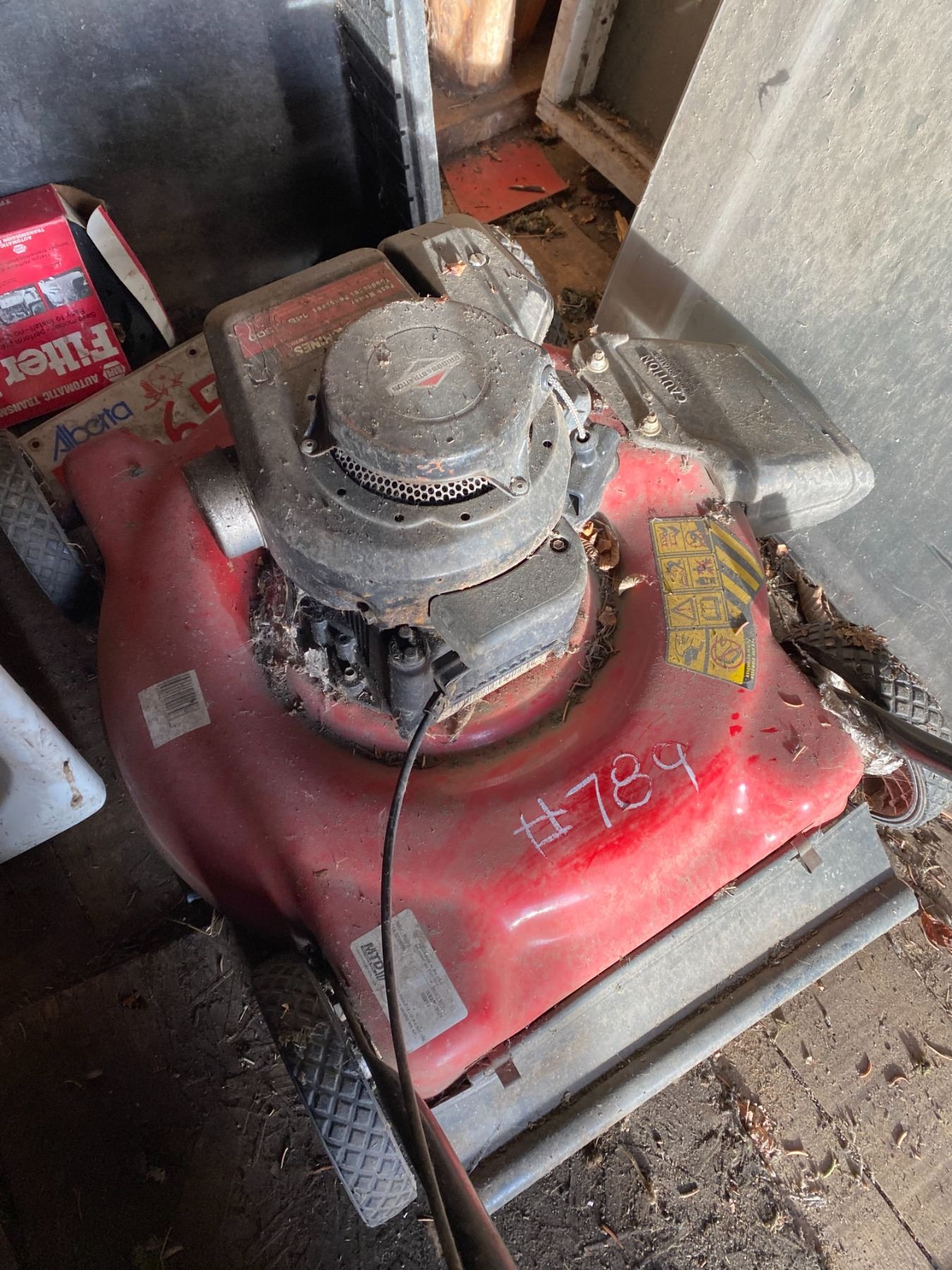 Mower, shovels, window frames, misc. wood, sink, weed eater & misc.