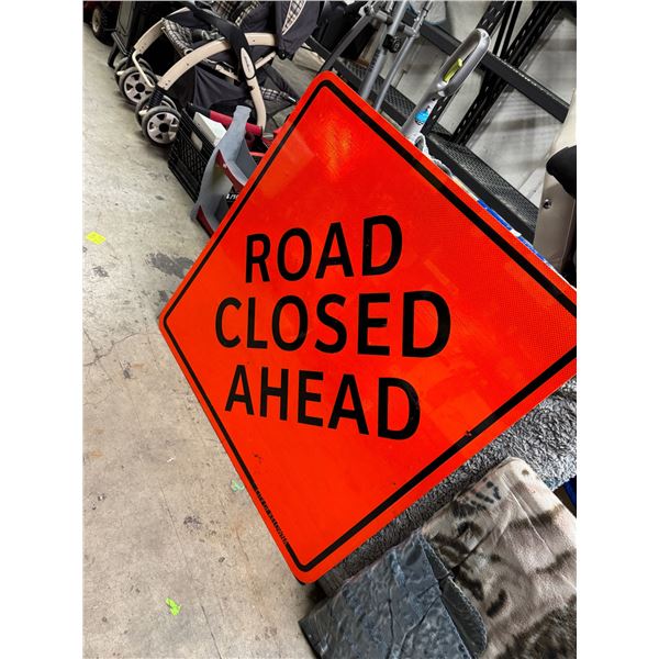 Road closed ahead sign