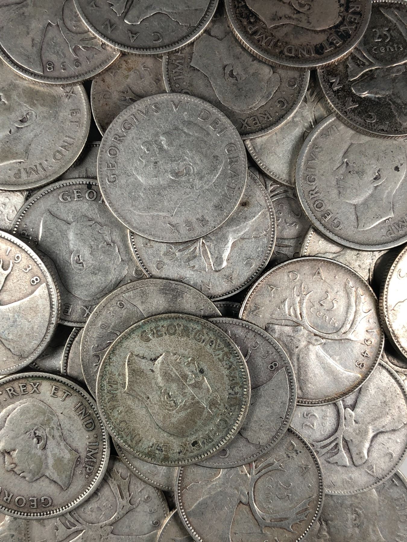 One Roll of King George Circulated Quarters