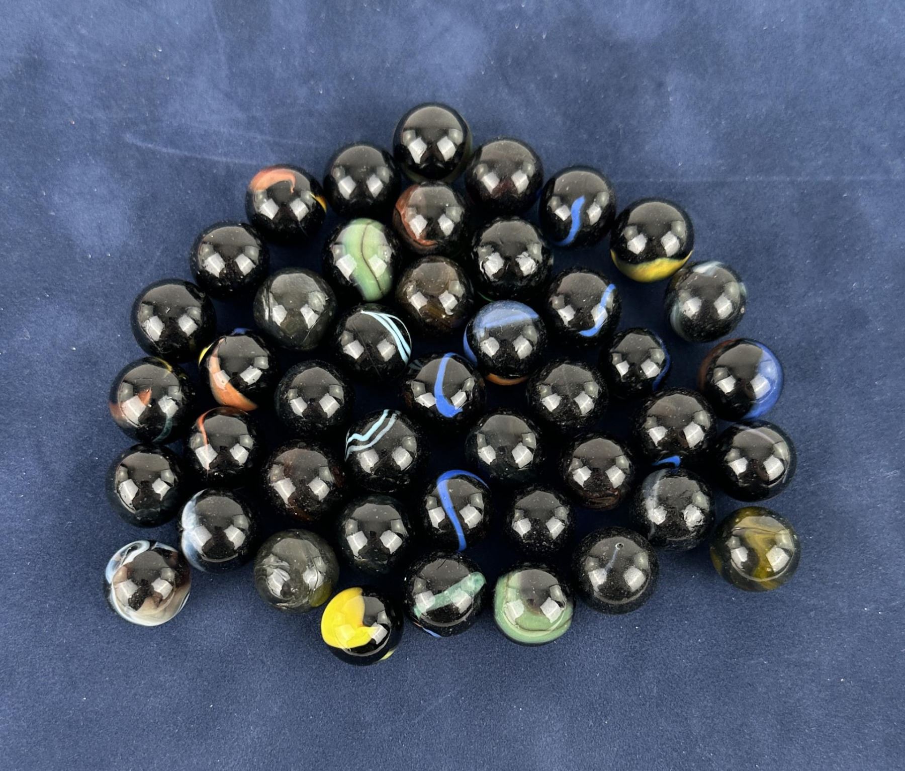 Collection of Antique Black Swirl Marbles