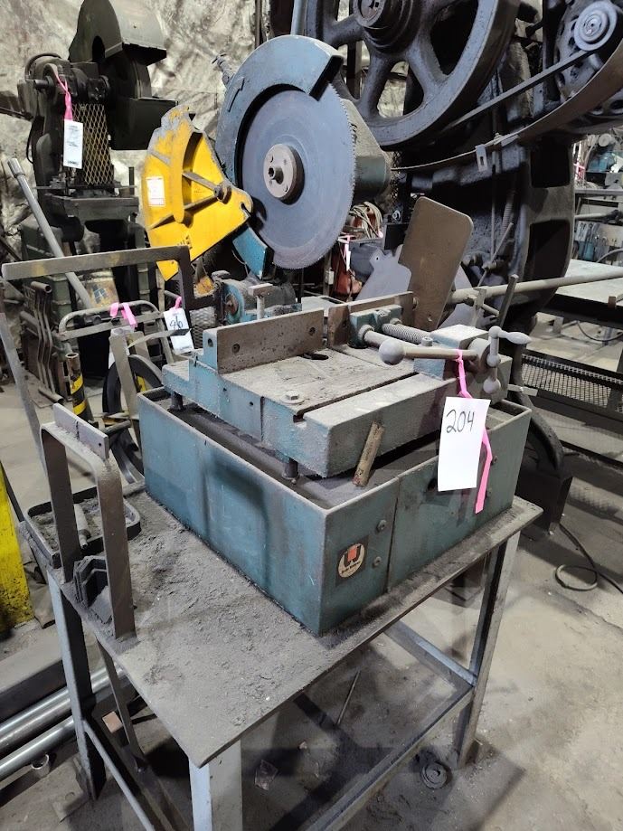 INDUSTRIAL CUT OFF SAW ON STEEL STAND (NEEDS REPAIR)