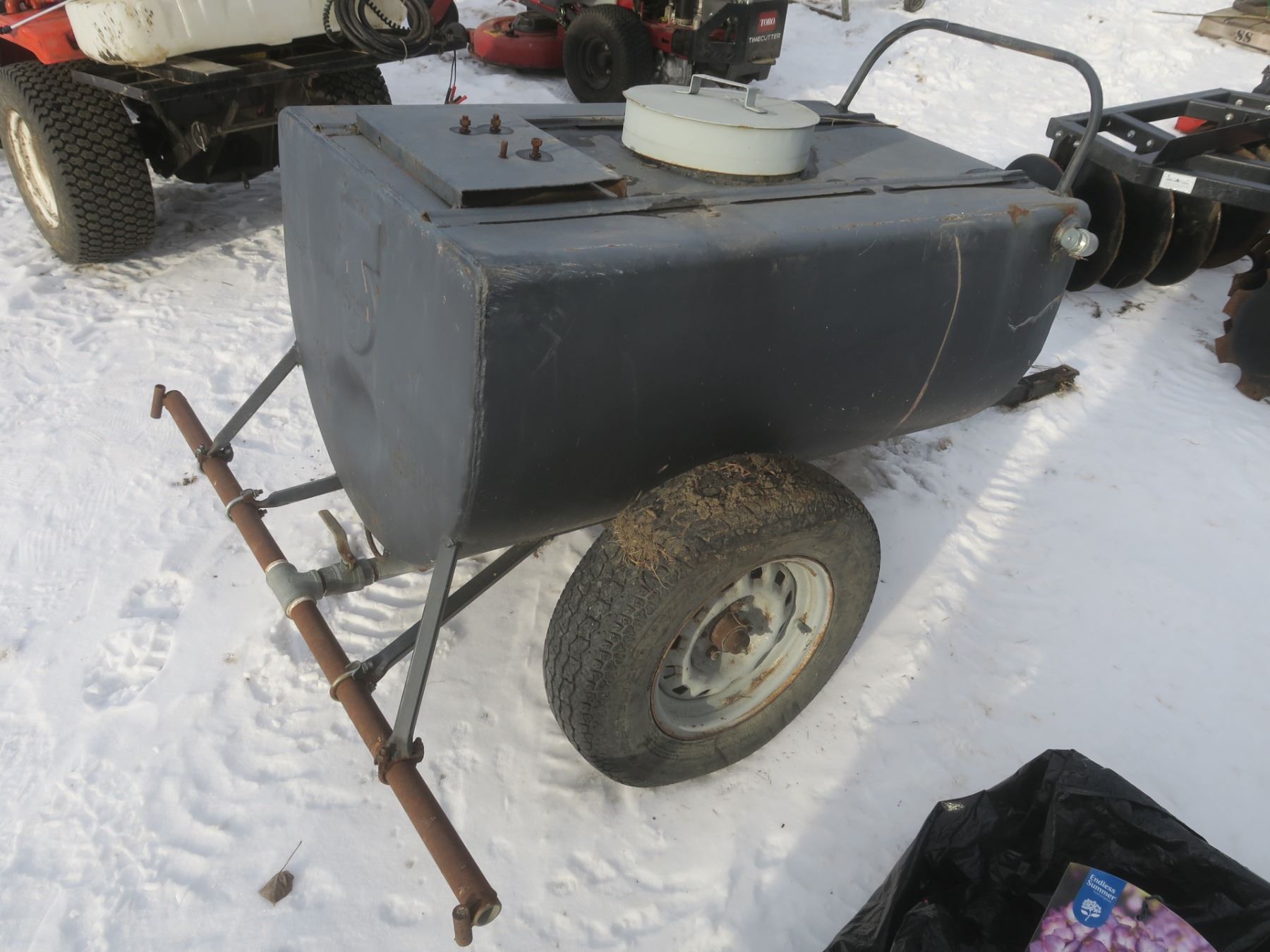 steel non-potable water tank on wheels with water nozzle - Schmalz Auctions