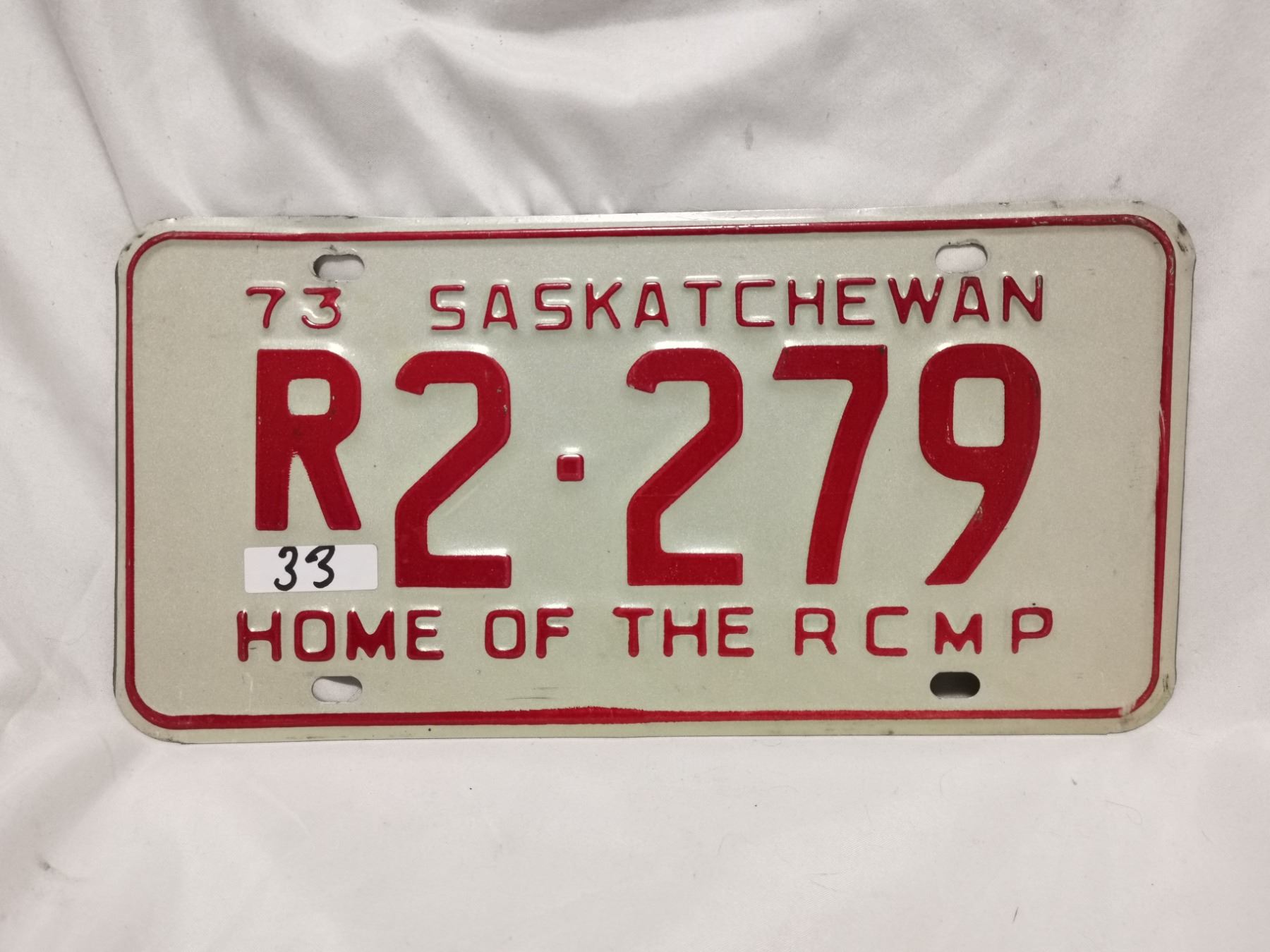 Rare 1973, R Saskatchewan license plate, Restricted - Schmalz Auctions
