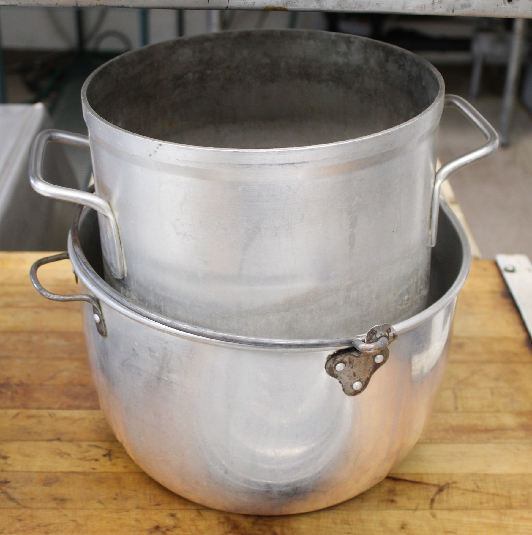 TWO LARGE COOKING POTS