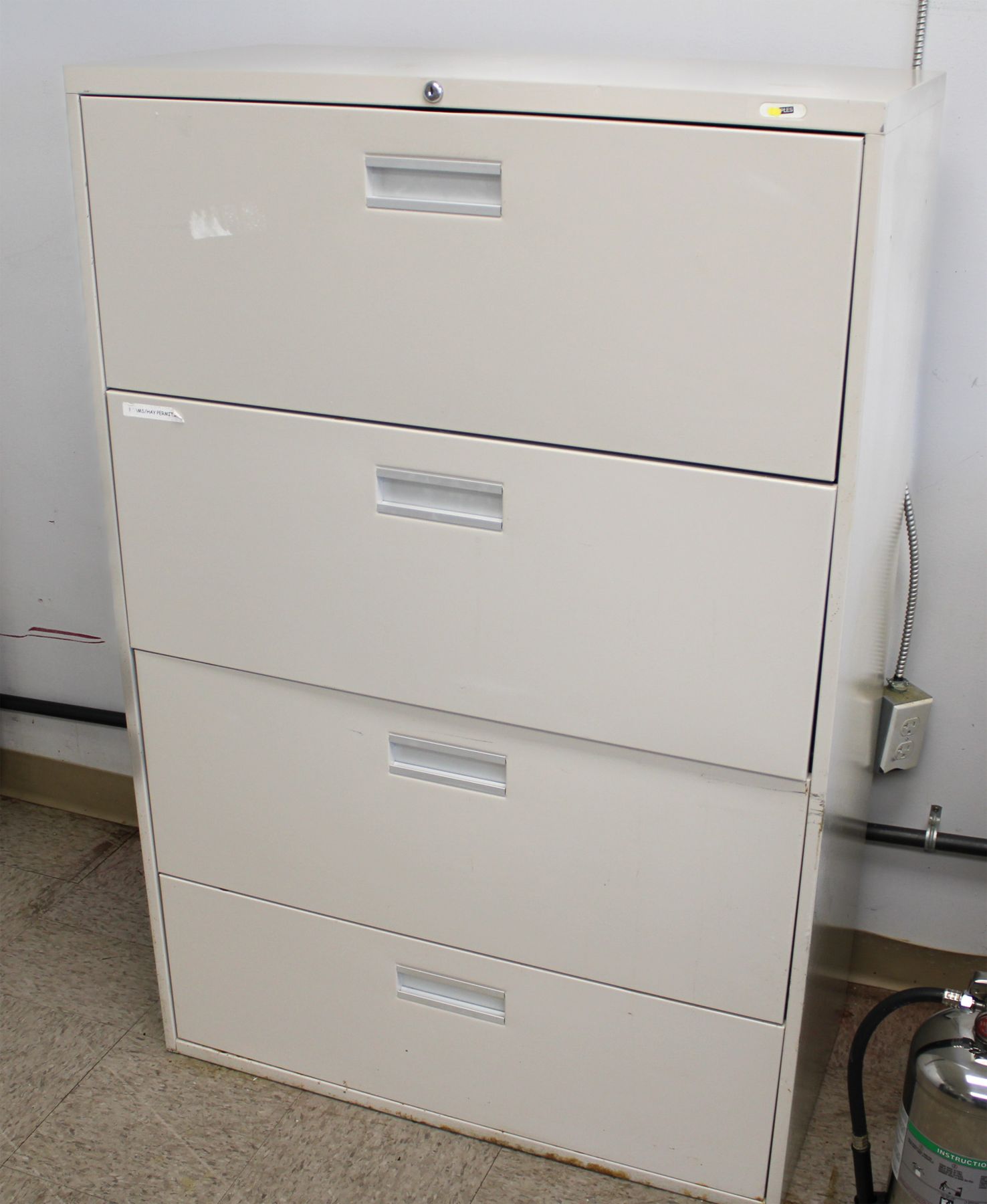 FOUR DRAWER STAPLES FILING CABINET