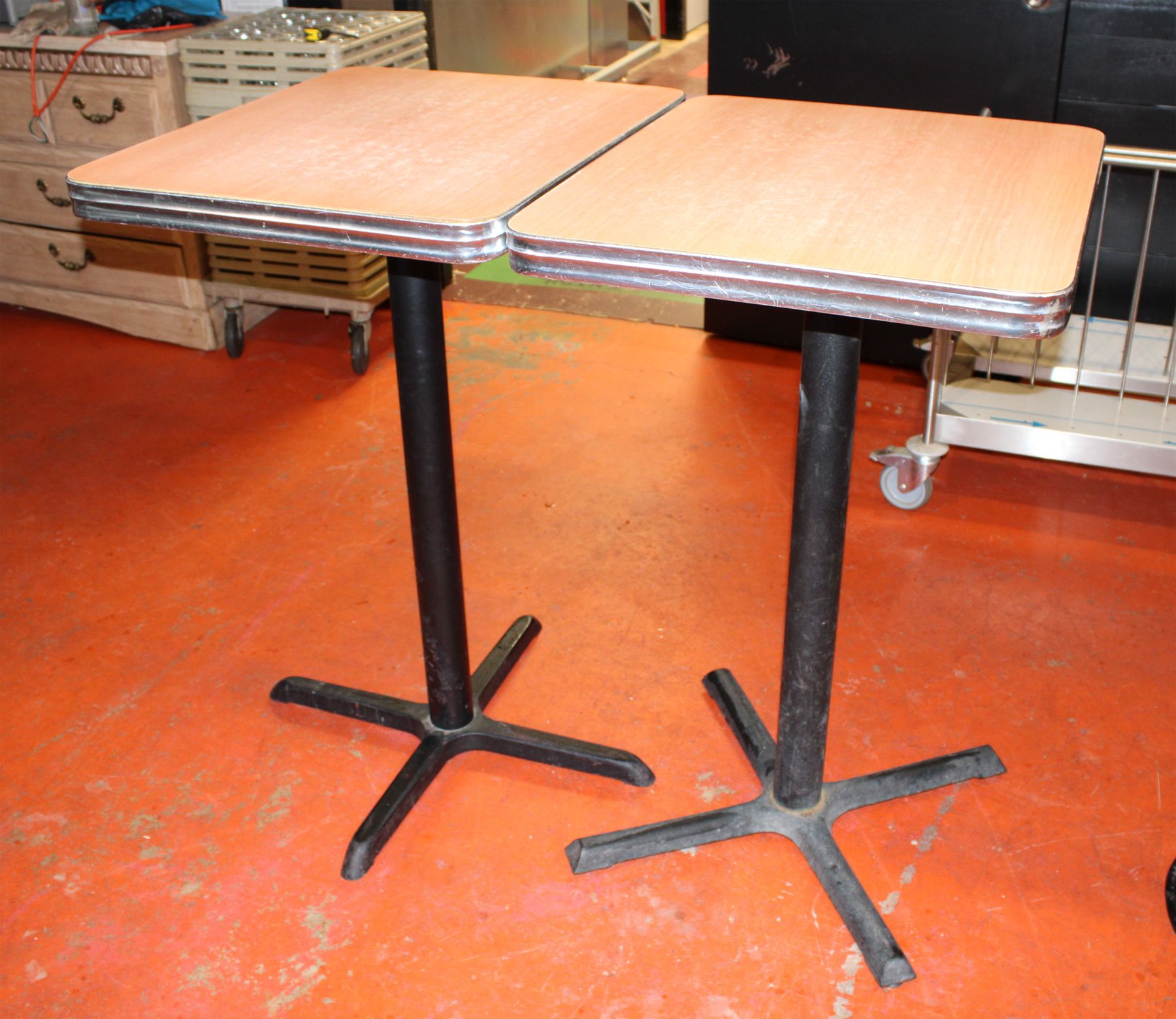 PAIR OF RAISED RESTAURANT TABLES
