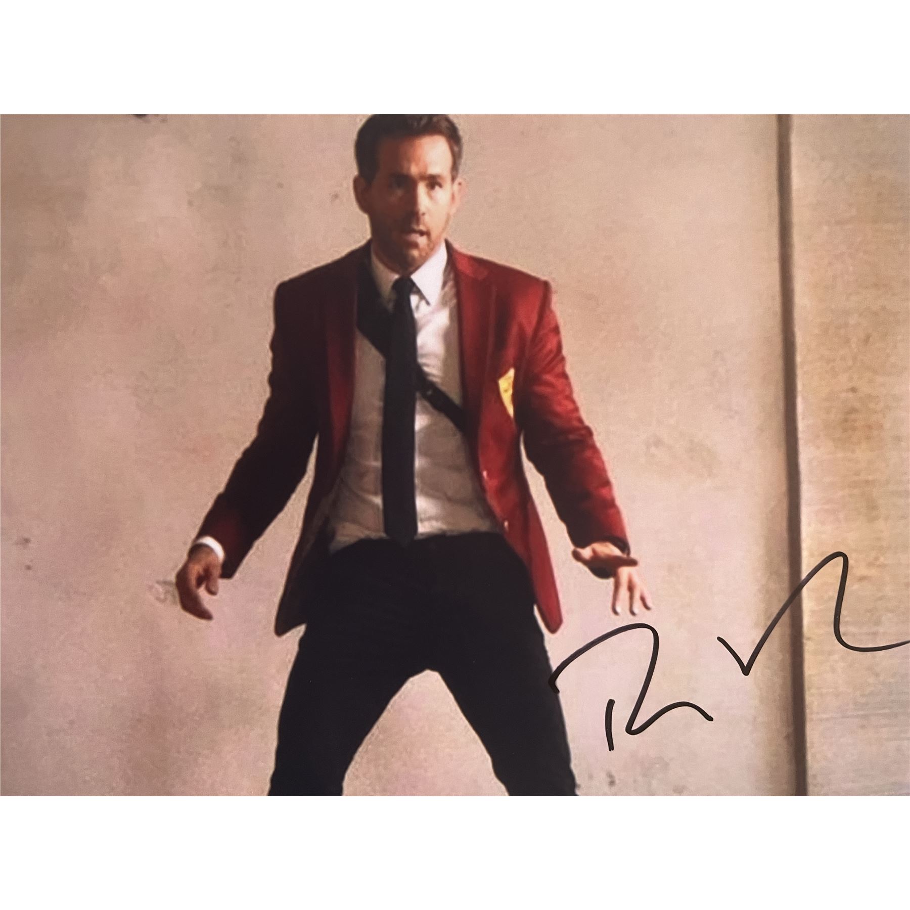 Red Notice Ryan Reynolds signed photo. GFA Authenticated
