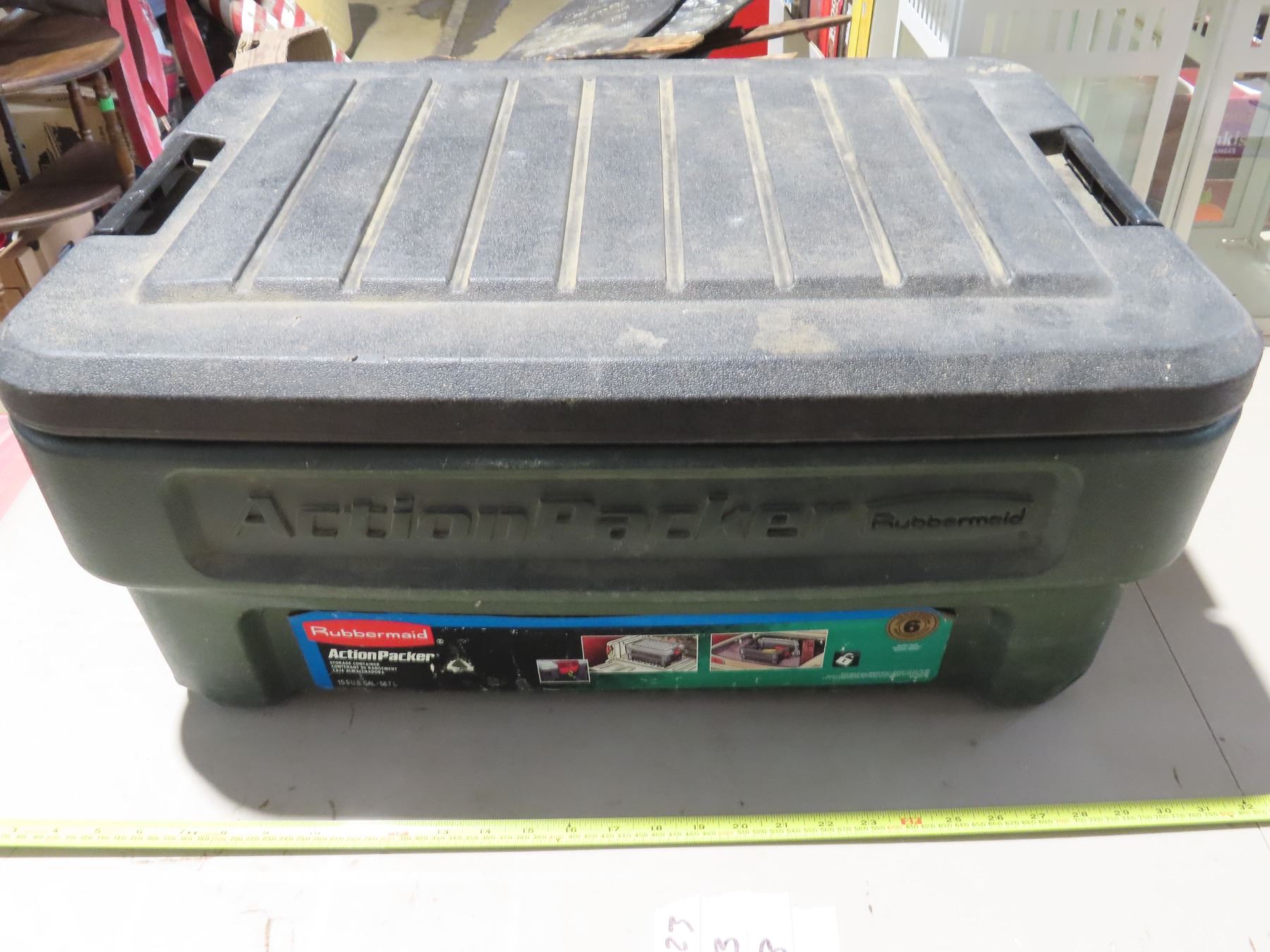 58.7L rubber maid action packer - Schmalz Auctions