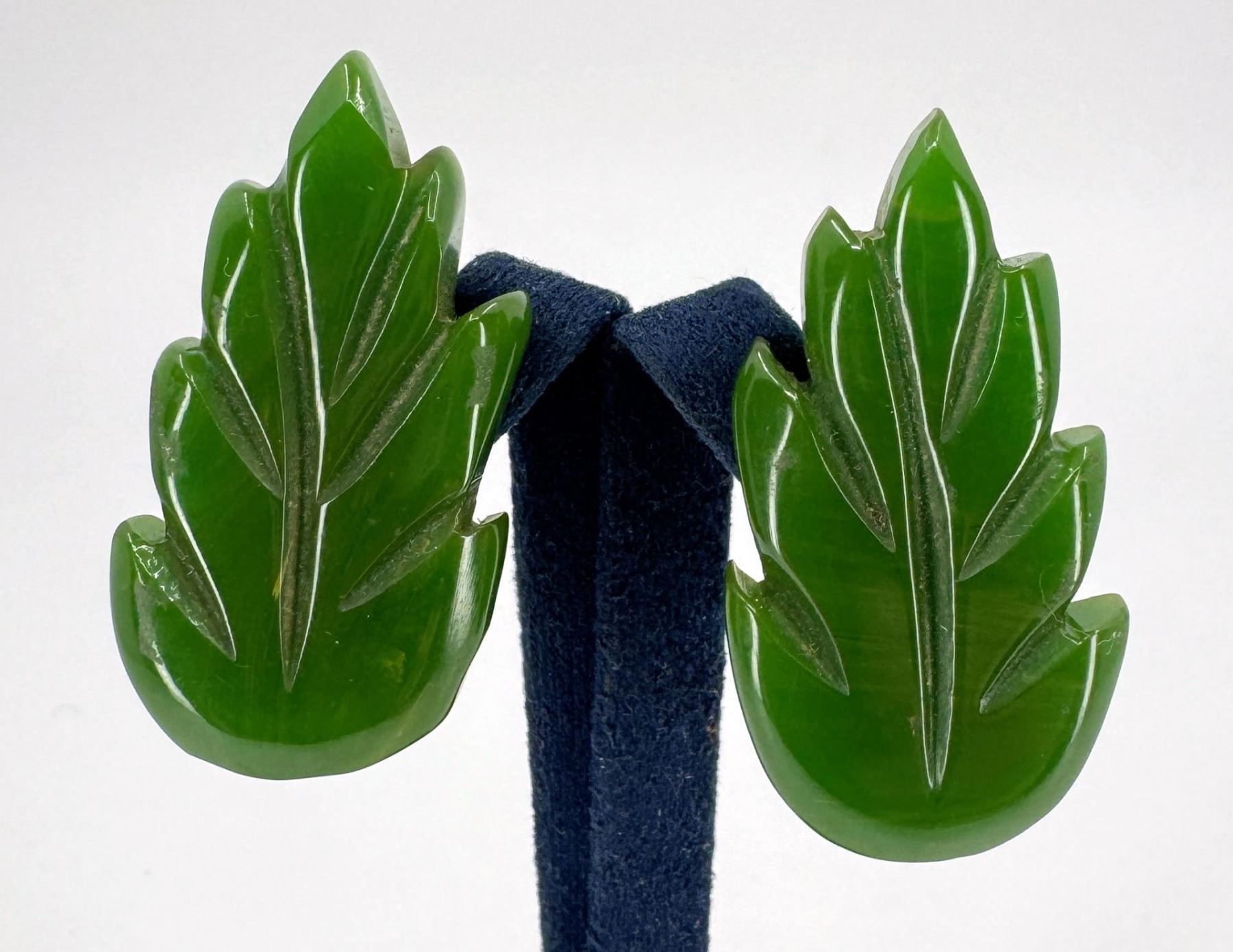 Antique Green Carved Bakelite Fur Clips