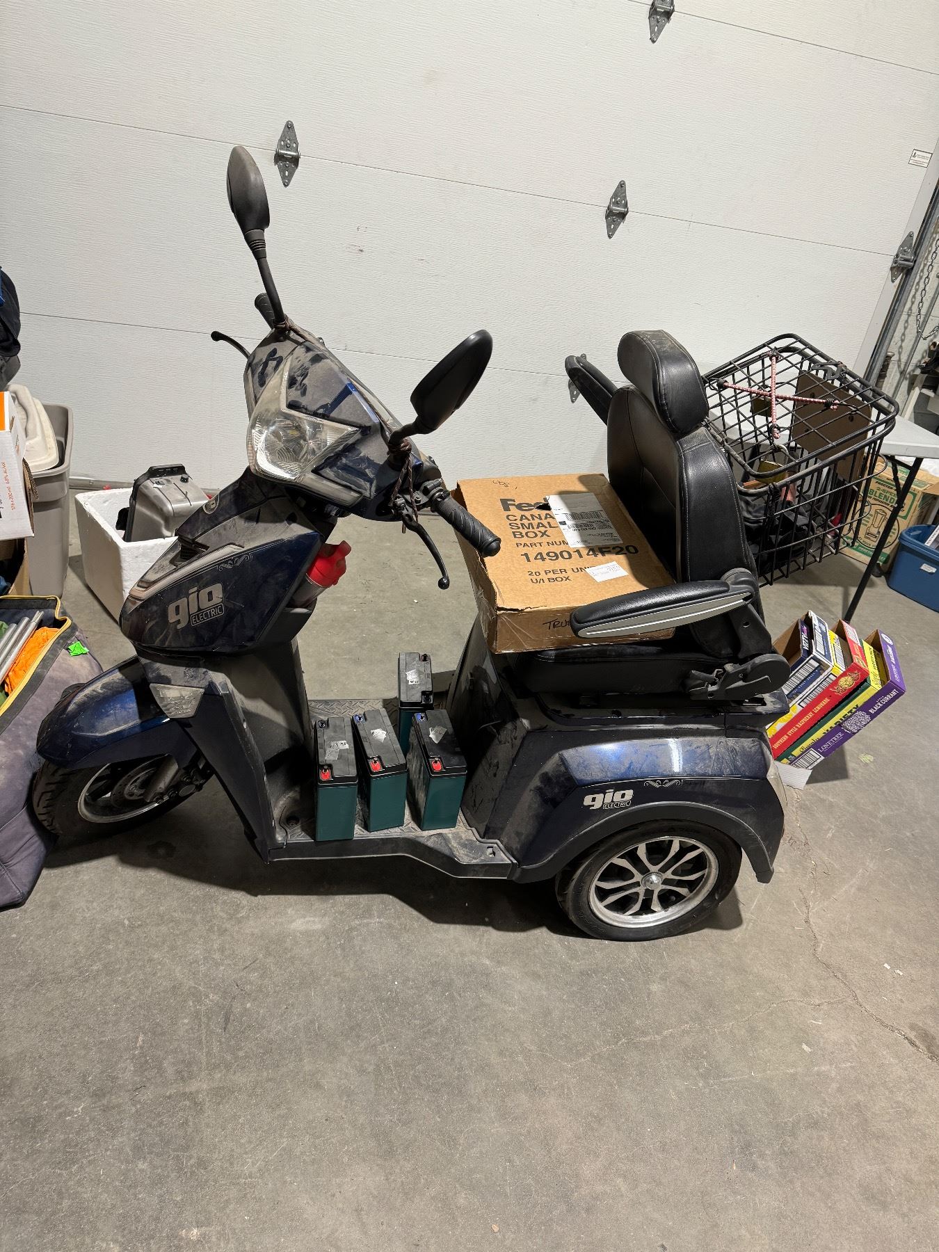 Gio electric scooter keys at till