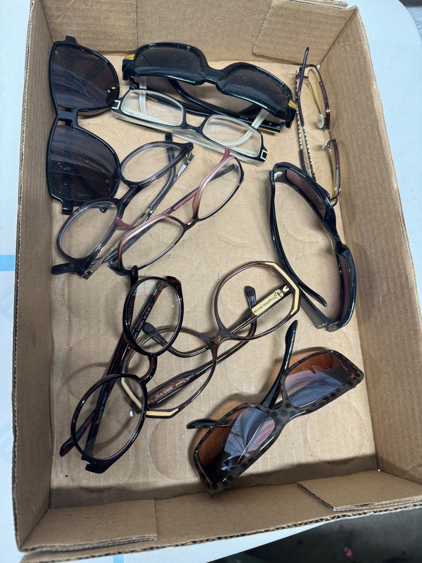 Assorted glasses and frames