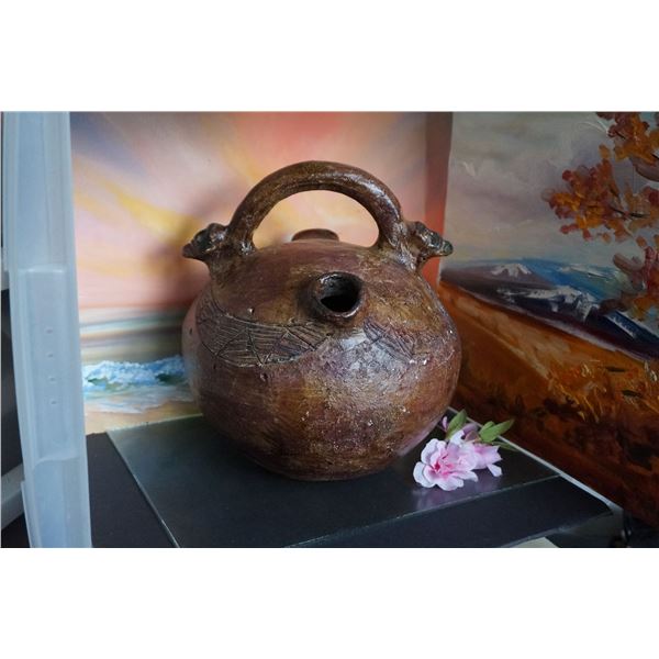 Vintage pottery water vessel