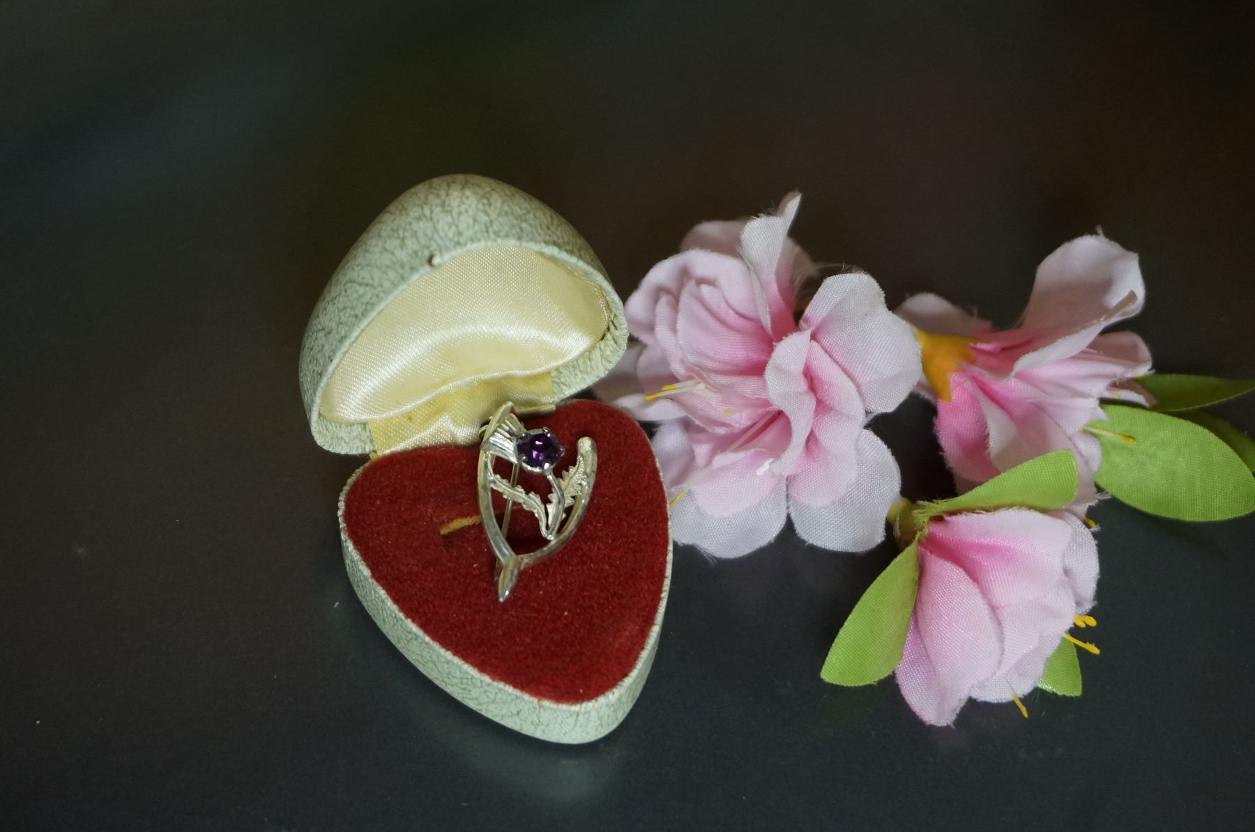 Vintage silver Scottish brooch with thistle and Amethyst paste stone