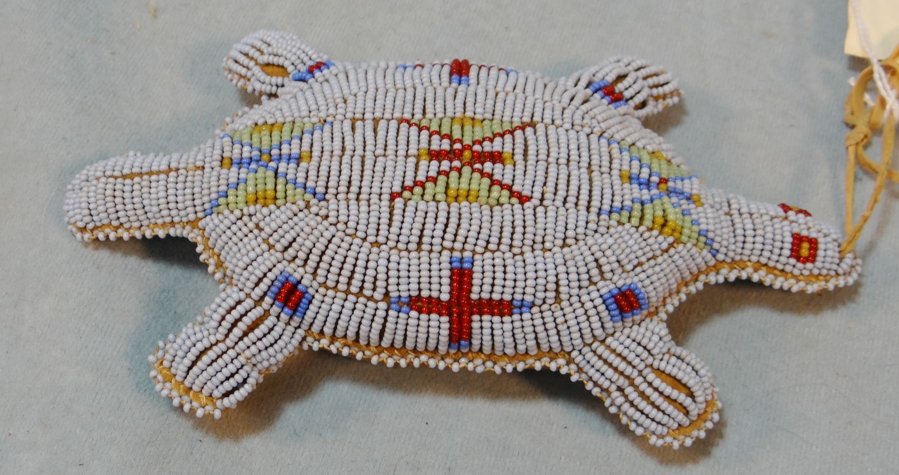 (2) Lakota Sioux beaded amulets, shaped, 6" & 5 «", ca. 1880's