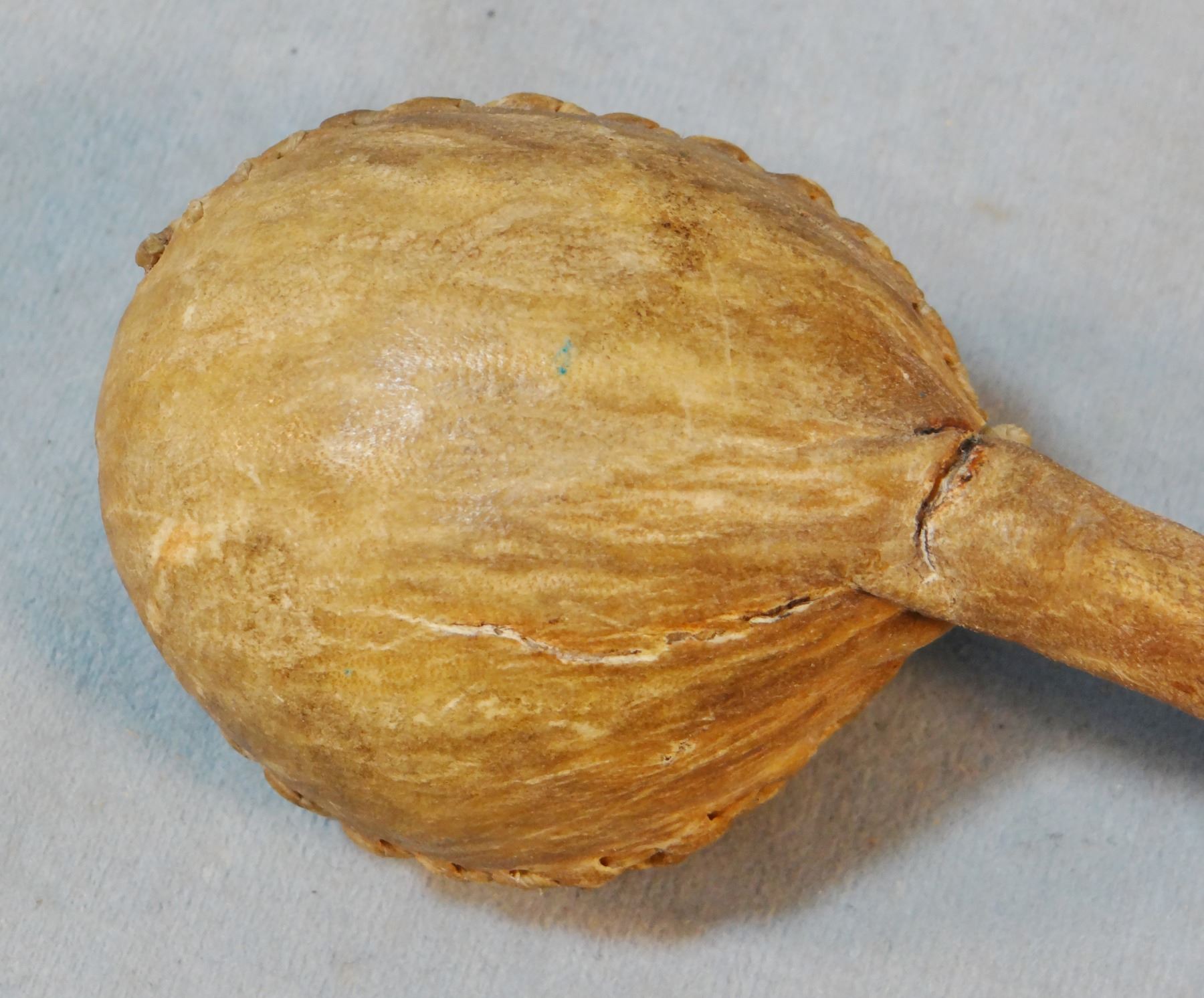 Sioux stone war club, rawhide covered stone, 11", sinew sewn