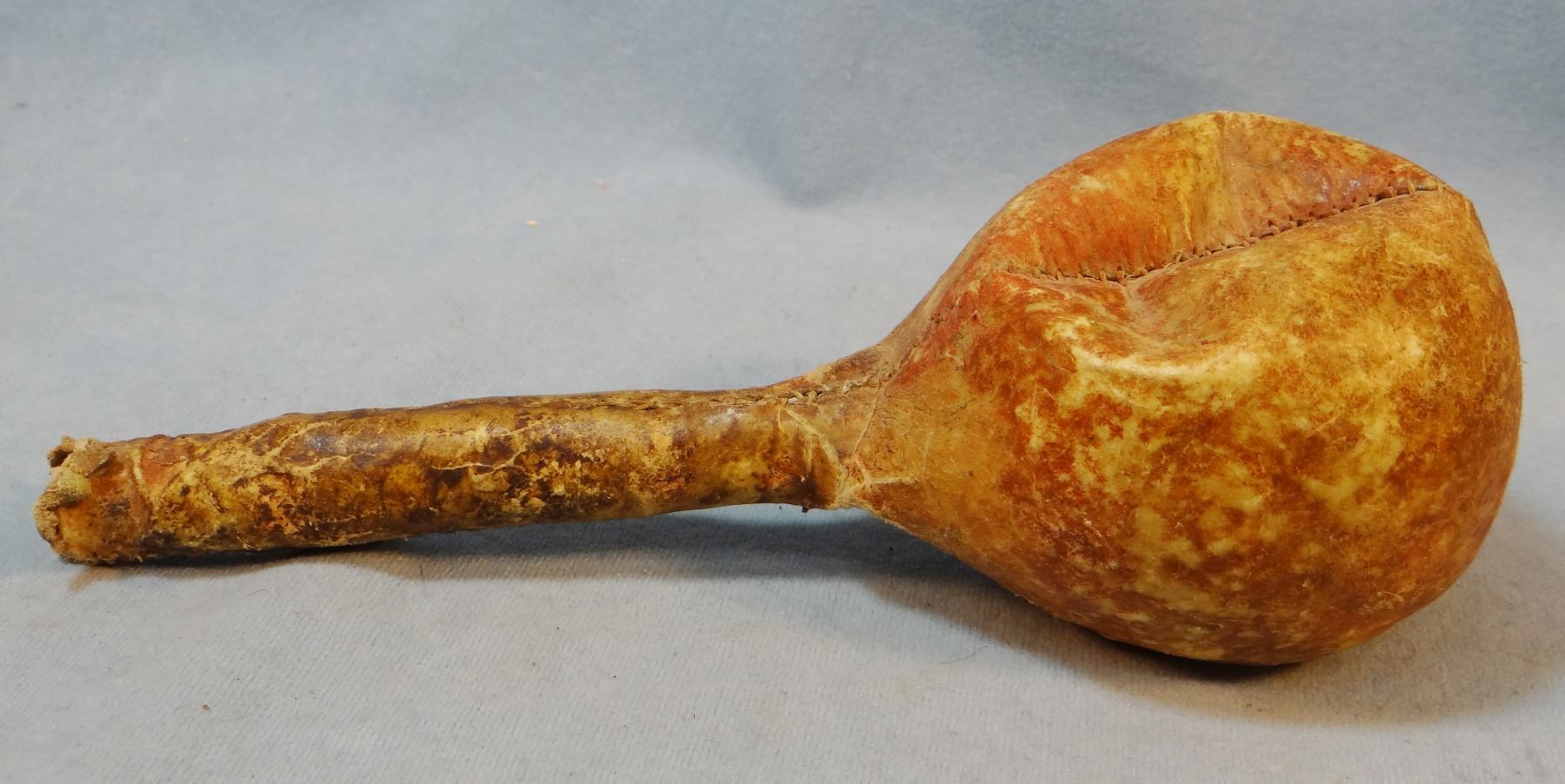 Blackfeet rawhide rattle, 9"