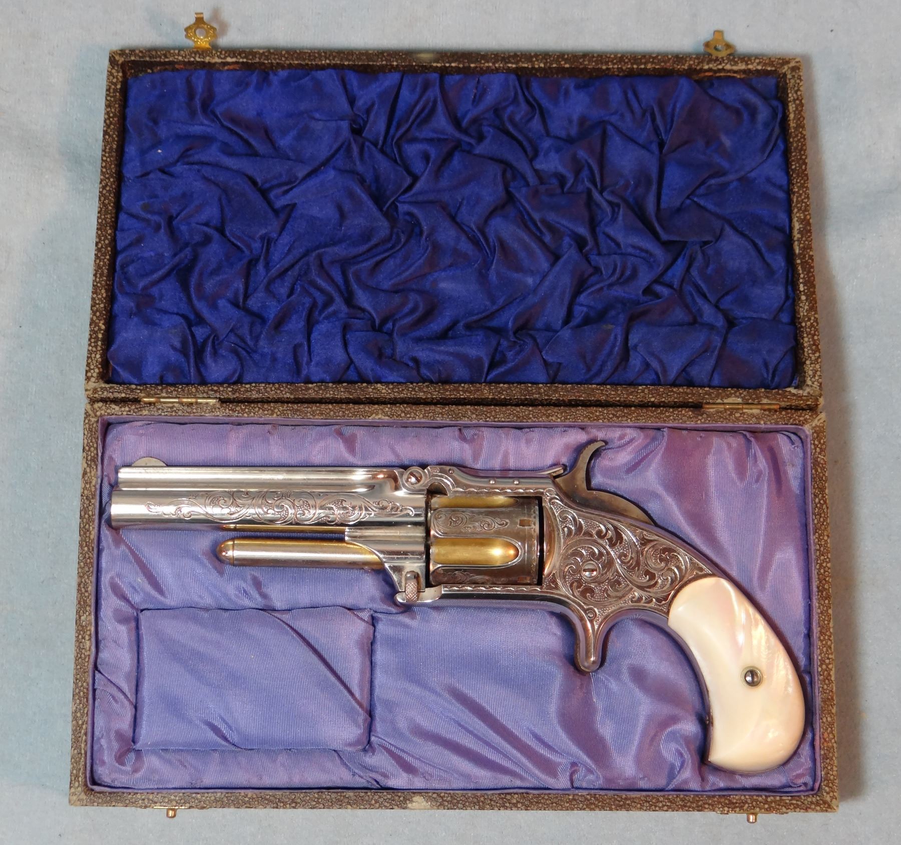 S & W No. 1 « Issue, cal. 32 R. F., gold, silver & nickel finish, punch ...