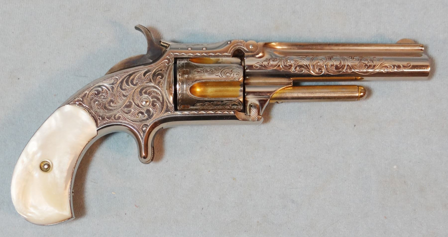 S & W No. 1 « Issue, cal. 32 R. F., gold, silver & nickel finish, punch ...