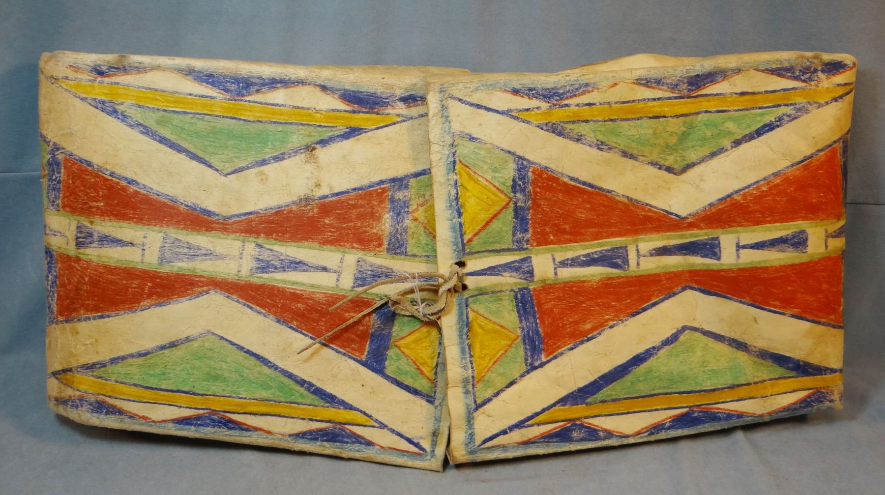 Painted rawhide parfleche, possibly traded by Crow to Yakima tribe