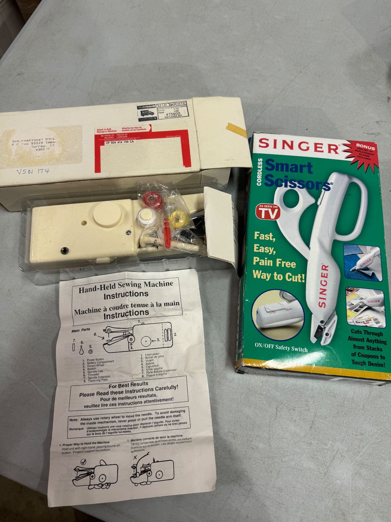 Singer smart scissors and hand held sewing machine