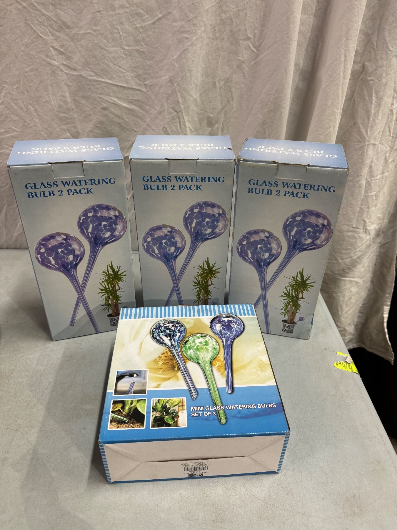 Glass watering bulbs