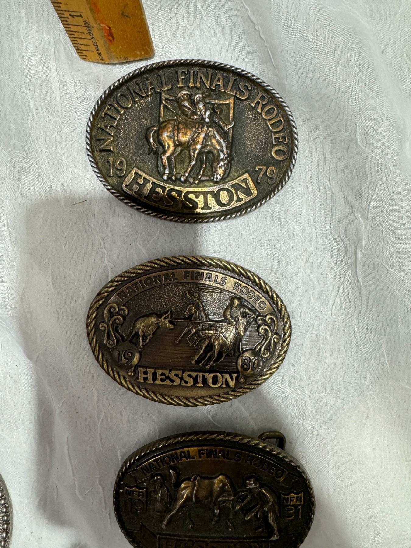 National Finals rodeo belt buckles 1-8edditiin and 1991