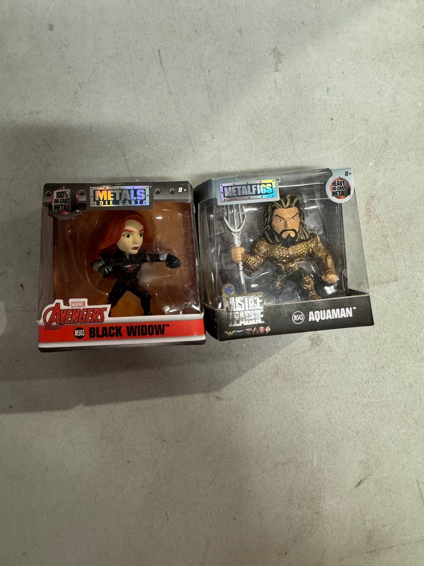 Metal figs aqua man and black widow