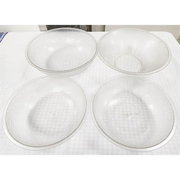 FOUR TEXTURED PLASTIC SALAD BOWLS