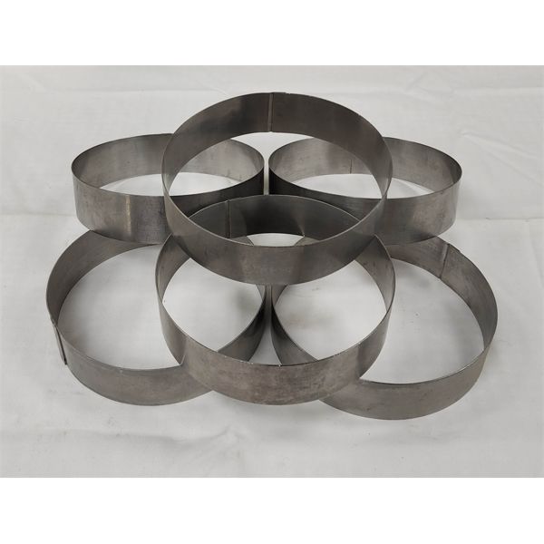 SIX STAINLESS STEEL CAKE RINGS