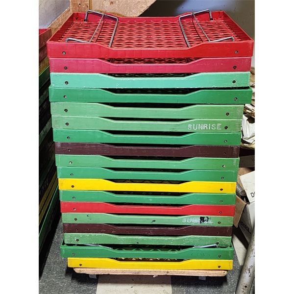 STACK OF BREAD TRAYS WITH ROLLING DOLLY
