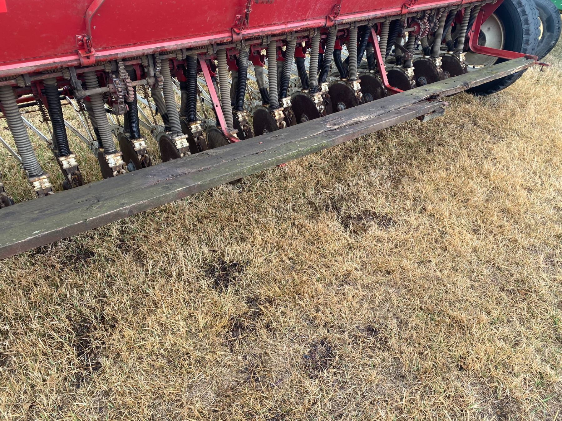 IH 12 ft rub. End wheel seed drill c/w grass & fertilizer