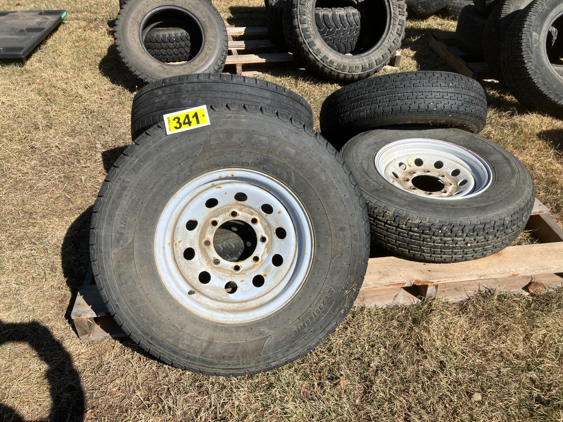 (Selling all together) 5- 16" tires. 8 hole trailer rims. Sells together.