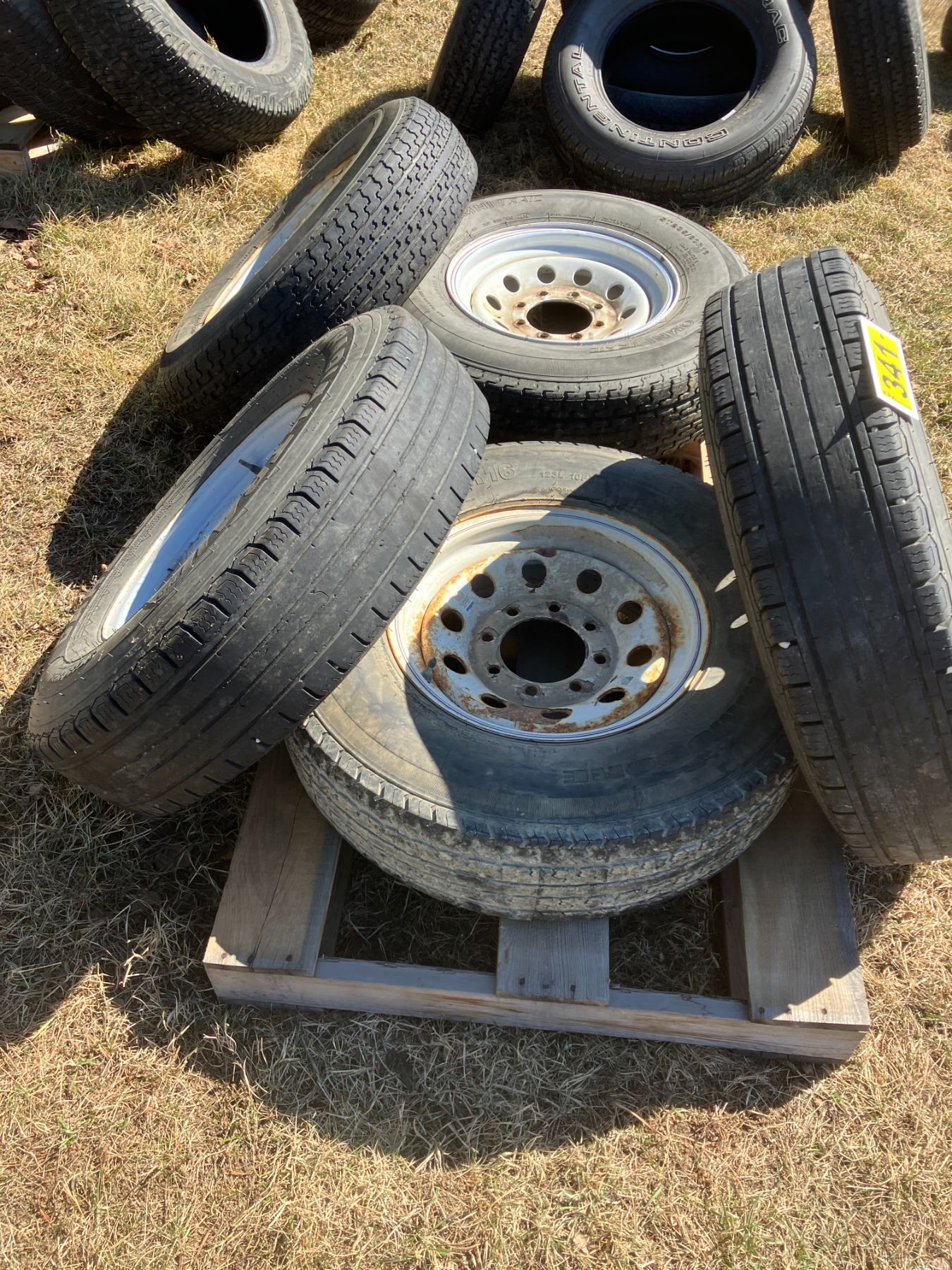 (Selling all together) 5- 16" tires. 8 hole trailer rims. Sells together.