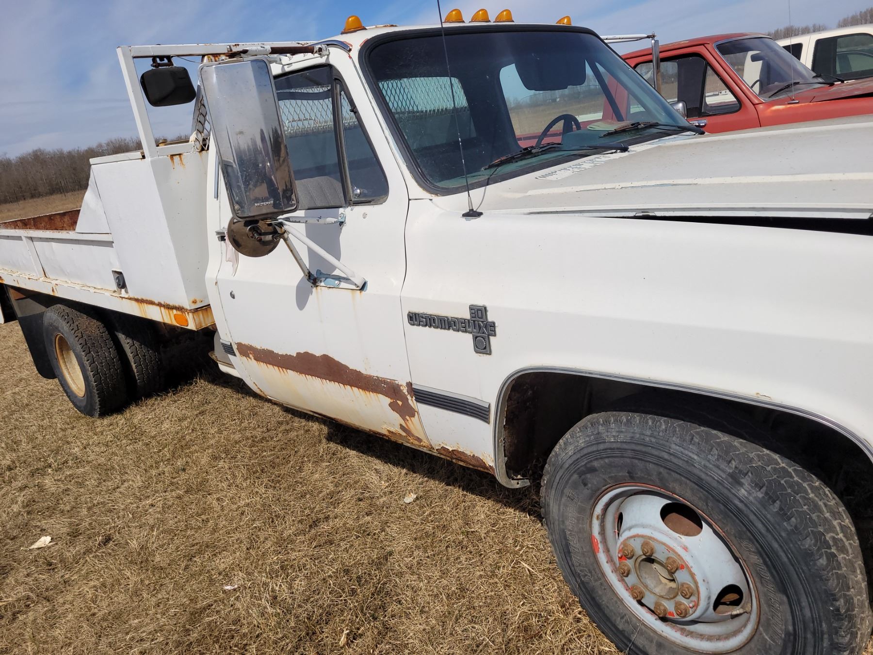 1988 Chev 30 Custom Delux V8 9'x7' Steel deck, has keys, turns over and fires and has a dent on the