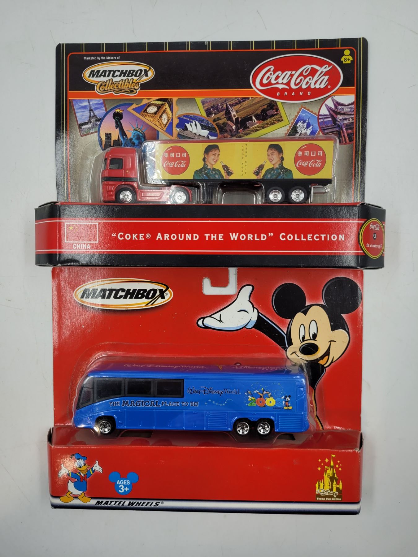 2 Sealed Matchbox diecast Coca Cola/Disney Truck & Bus